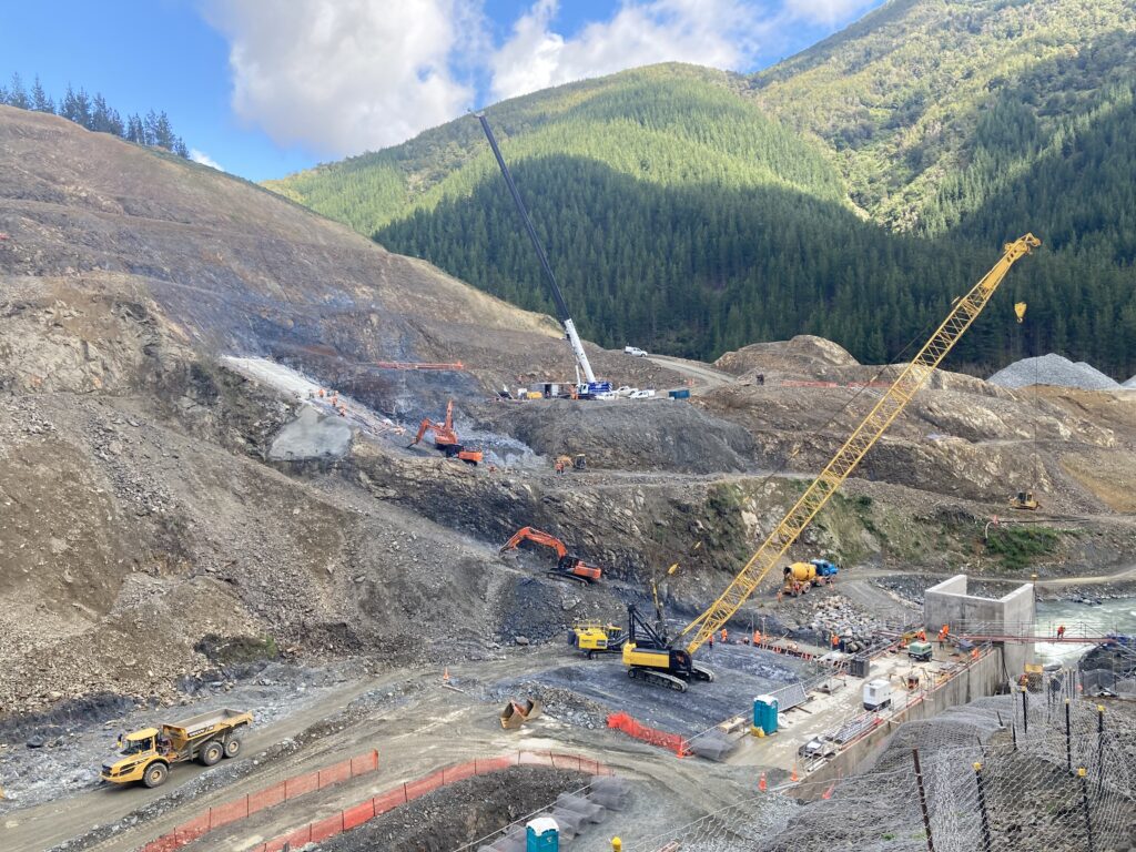 Overview of Downstream anchor slab work area and spillway excavation ...
