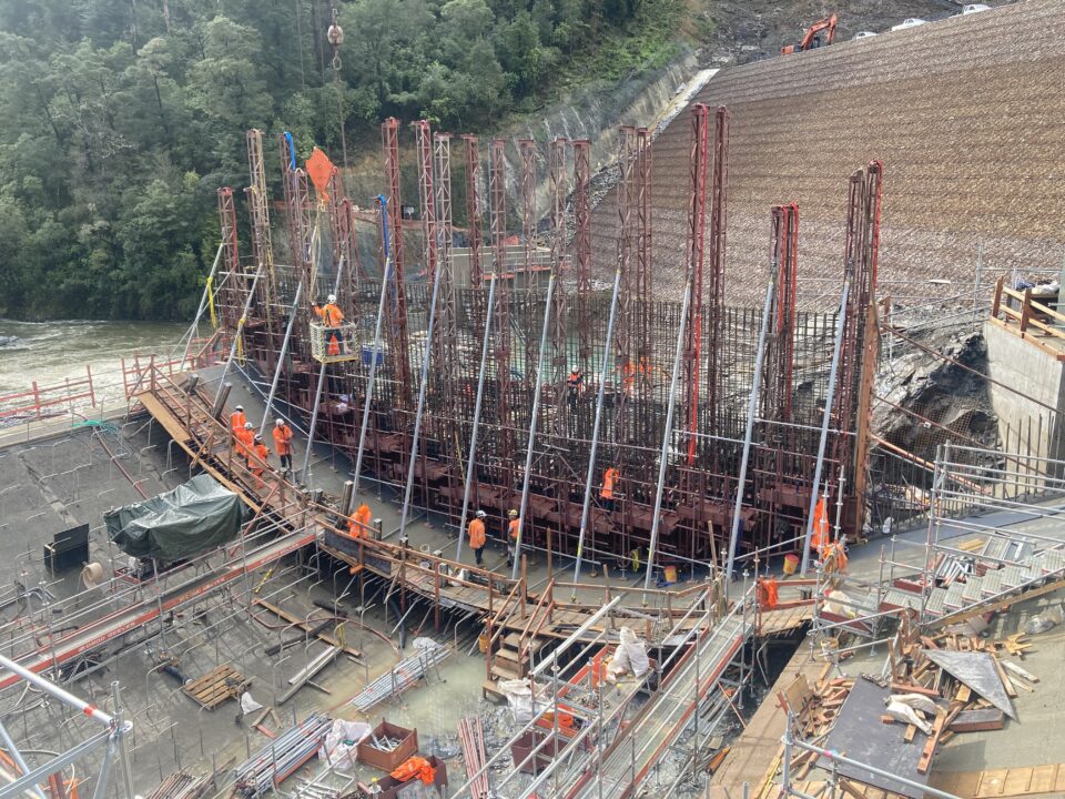 Setting up slipform formwork in Spillway flip bucket wall. – Waimea Water