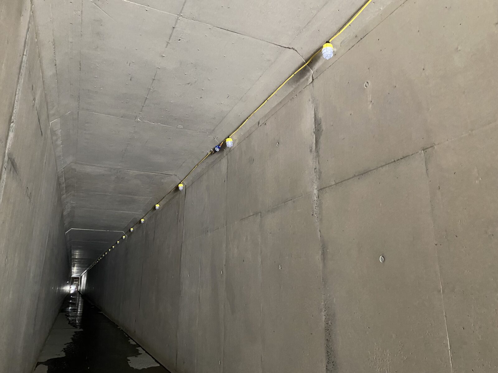Left hand side barrel of culvert with temporary lights installed ...